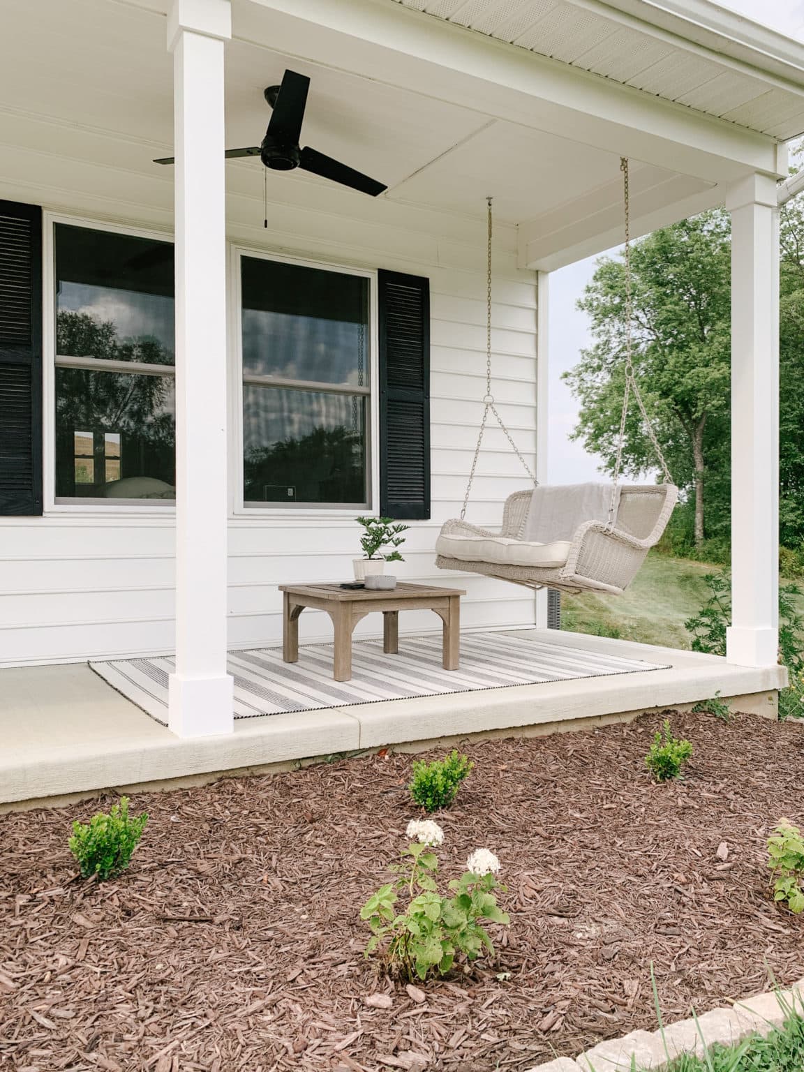 How to Update Skinny Porch Posts with PVC Trim - Sarah Jane Christy