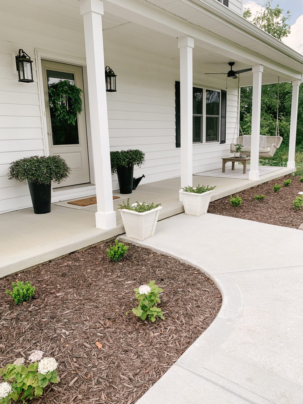How to Update Skinny Porch Posts with PVC Trim - Sarah Jane Christy