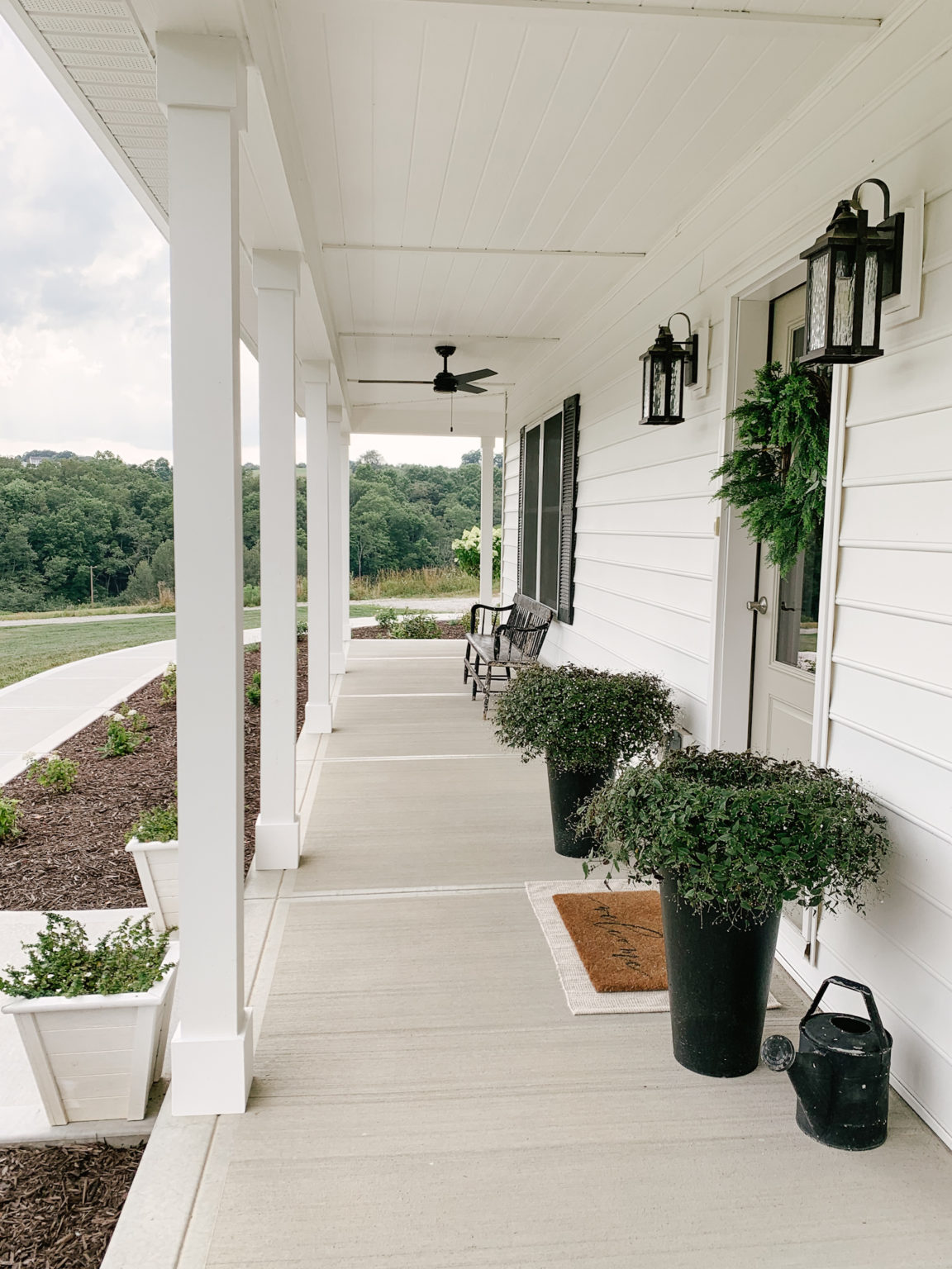 How to Update Skinny Porch Posts with PVC Trim - Sarah Jane Christy